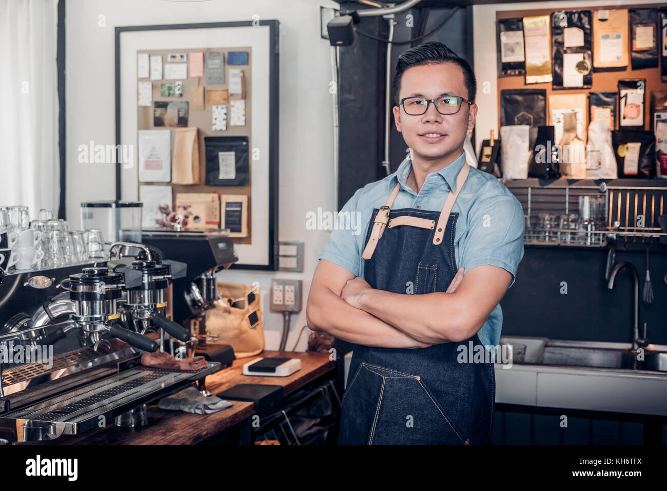 Male Barista cafe owner cross arms in store counter bar inside coffee ...