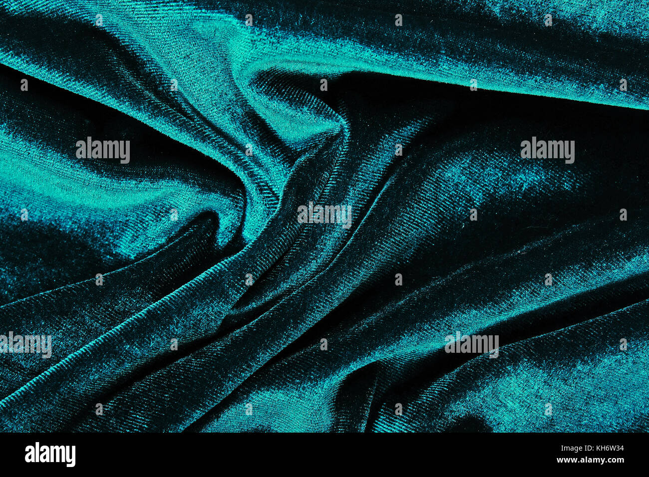 Blue turquoise velvet fabric cloth Stock Photo - Alamy