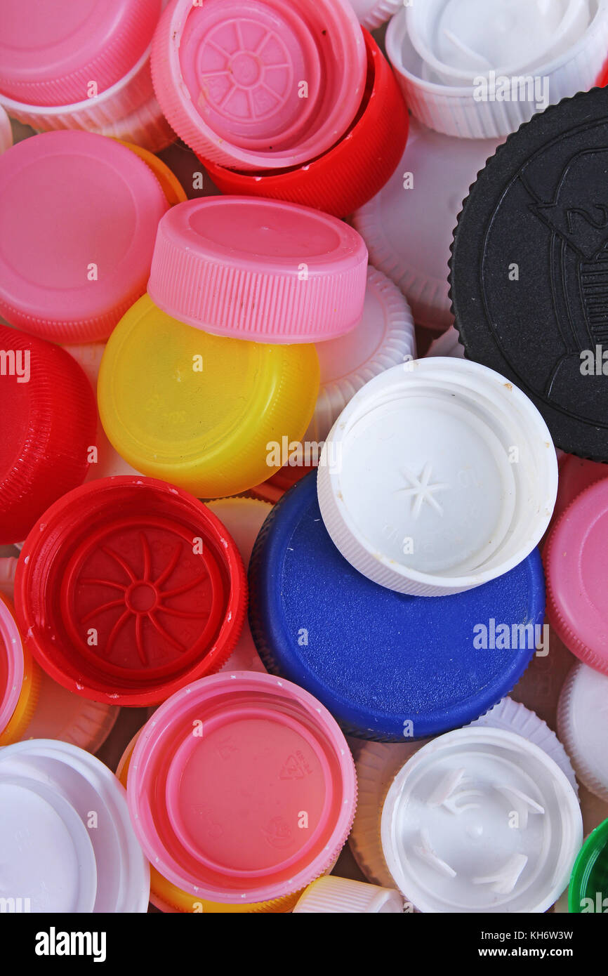 Plastic bottle caps. Close-up shot of stack of recyclable plastic ...