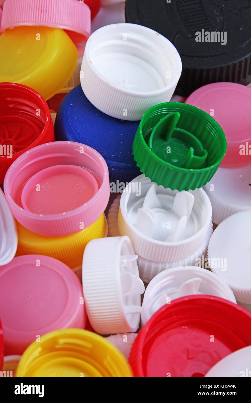 Plastic bottle caps. Close-up shot of stack of recyclable plastic ...