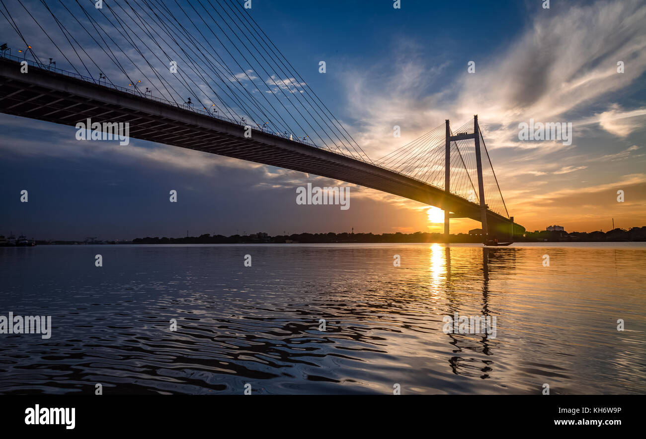 Vidyasagar setu the cable stayed bridge on river Hooghly at sunset. The ...
