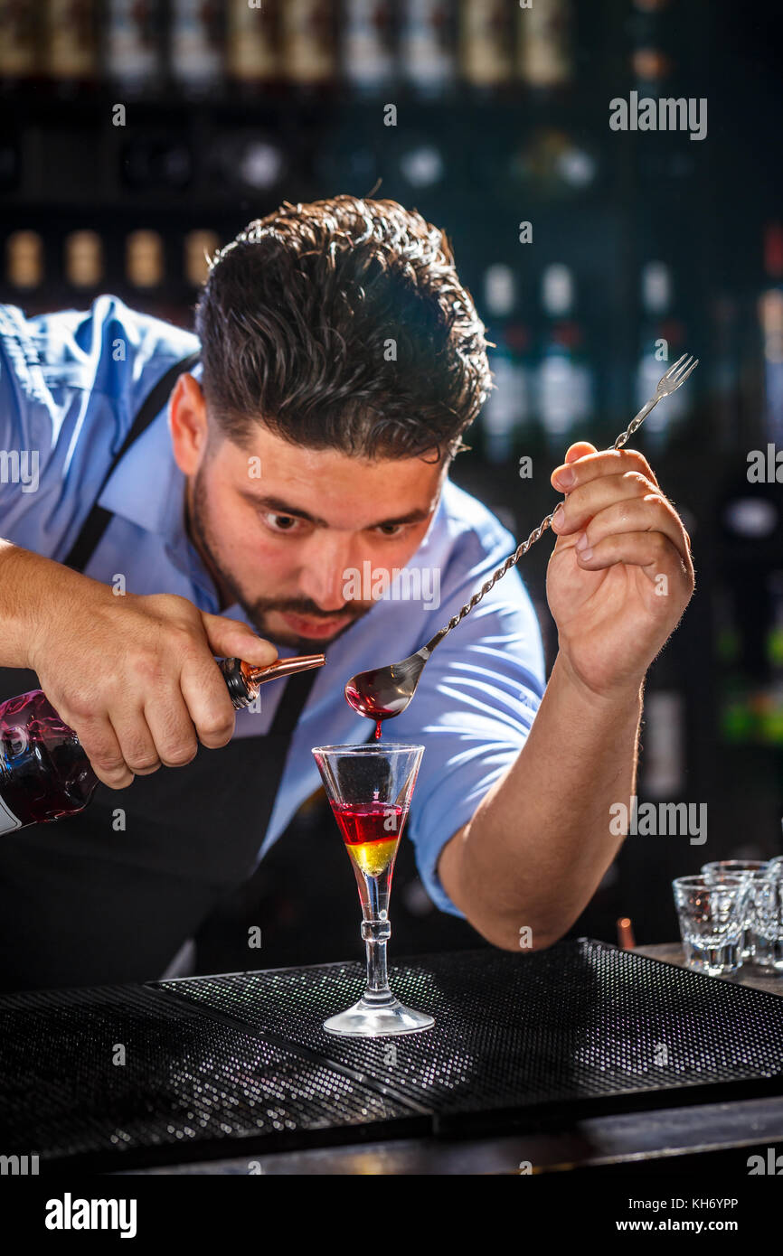 Bartender pouring liquor hi-res stock photography and images - Alamy