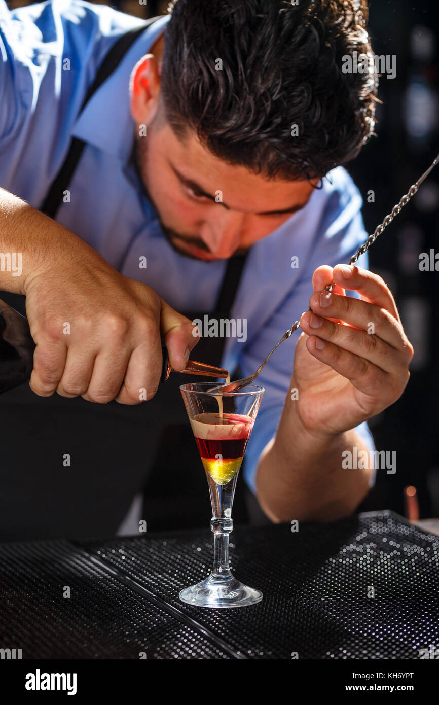 Bartender pouring liquor hi-res stock photography and images - Alamy