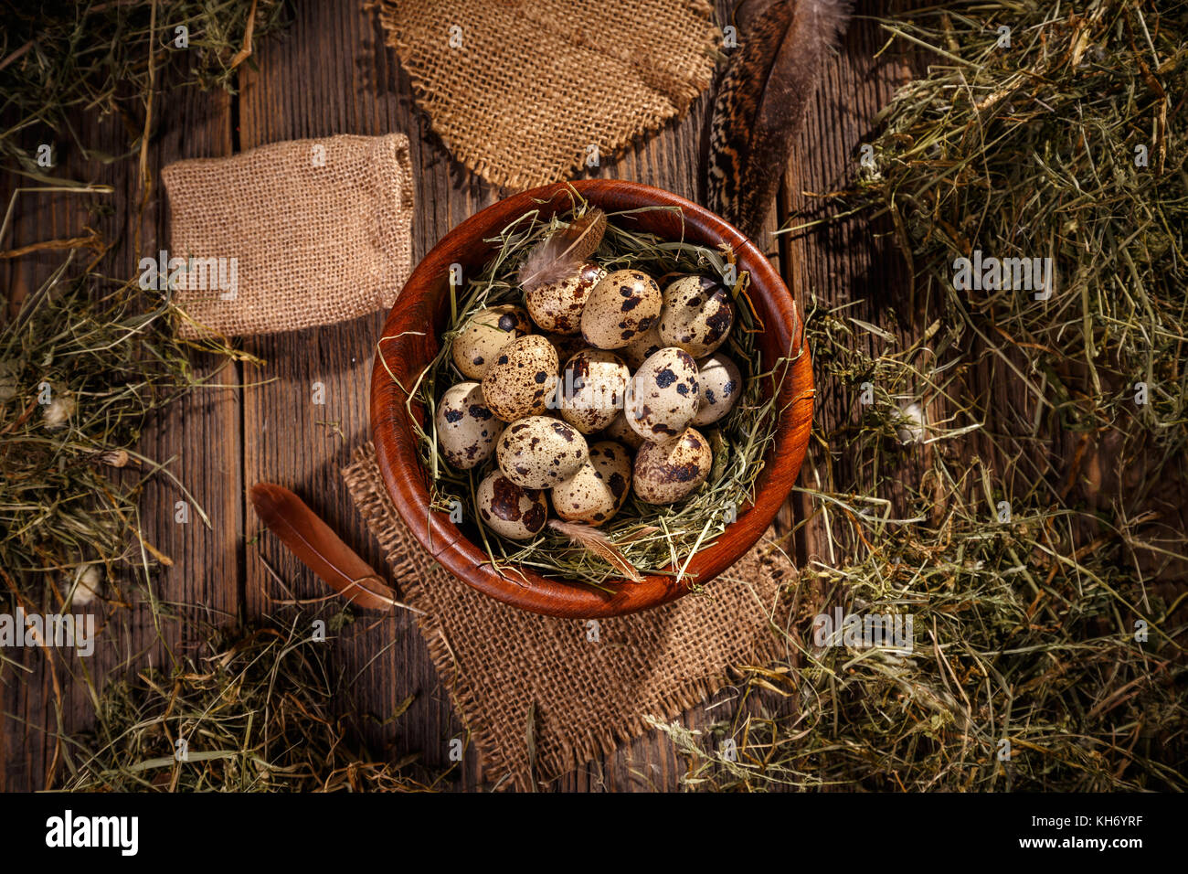 Top view of fresh quail egg in bowl on rustic wooden background Stock ...