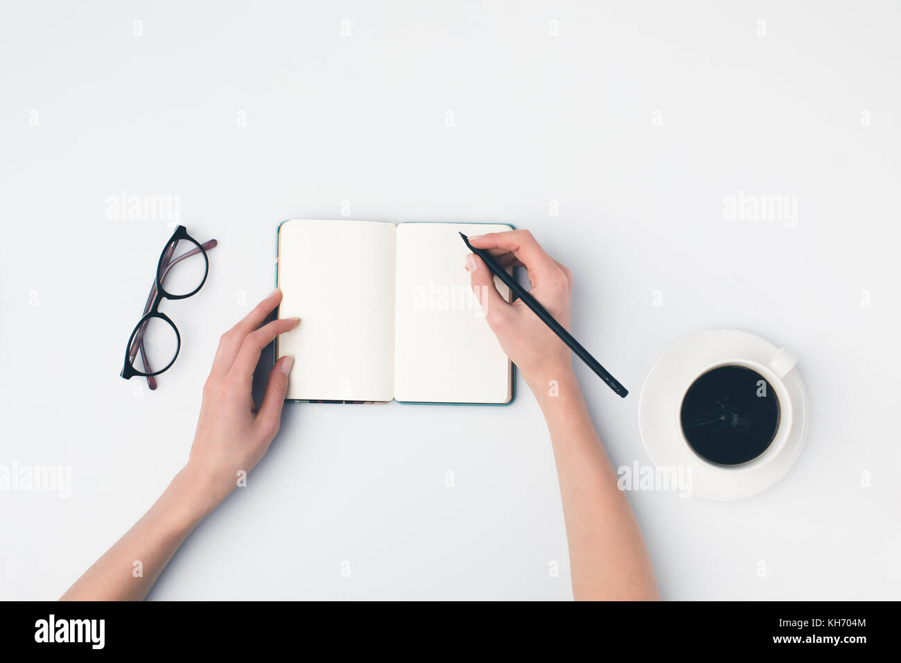 writing in notebok Stock Photo - Alamy