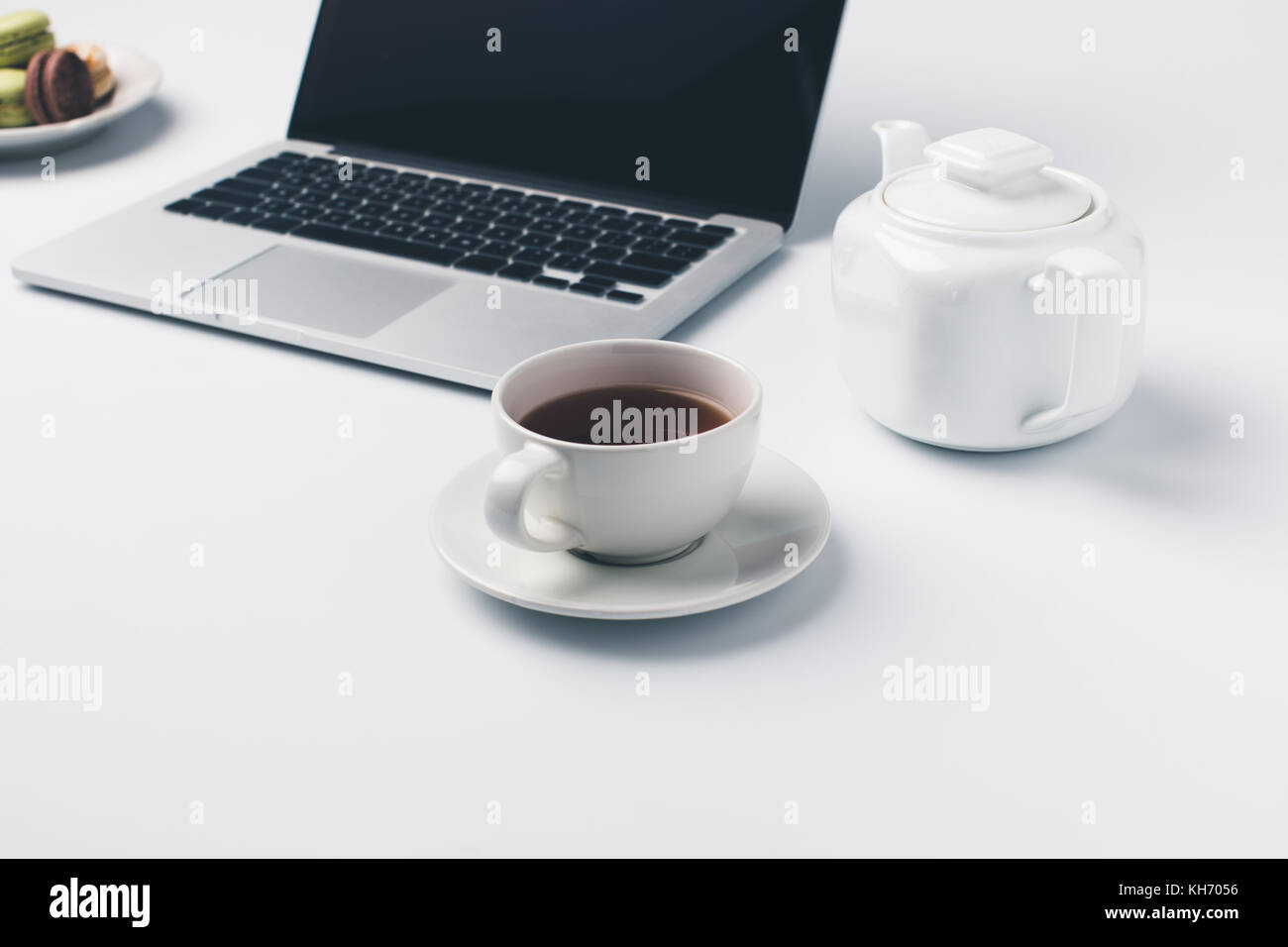 cup of tea and laptop Stock Photo - Alamy