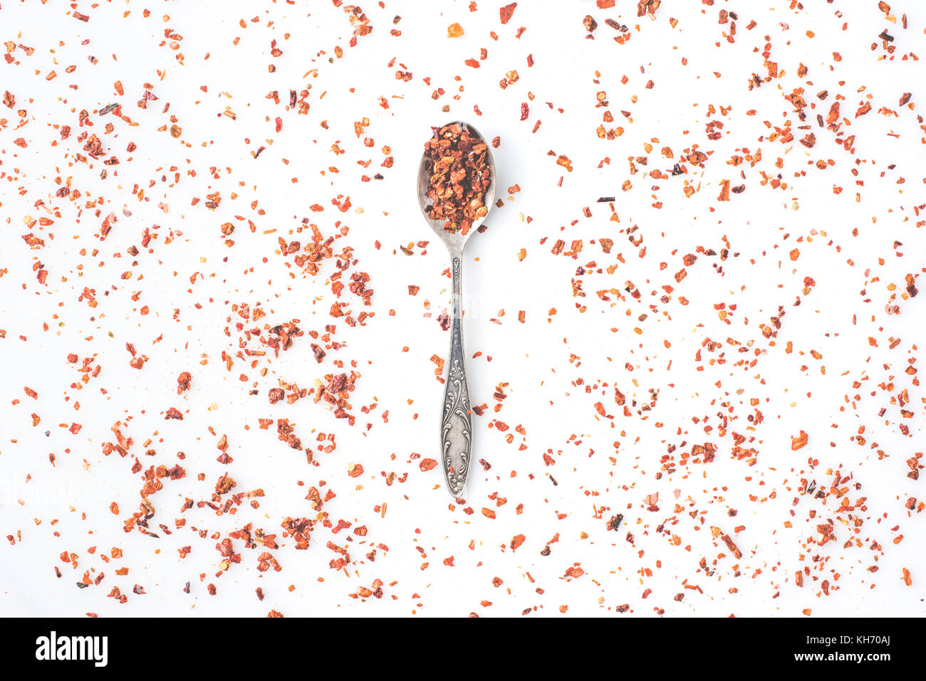 spoon with grated red pepper Stock Photo - Alamy