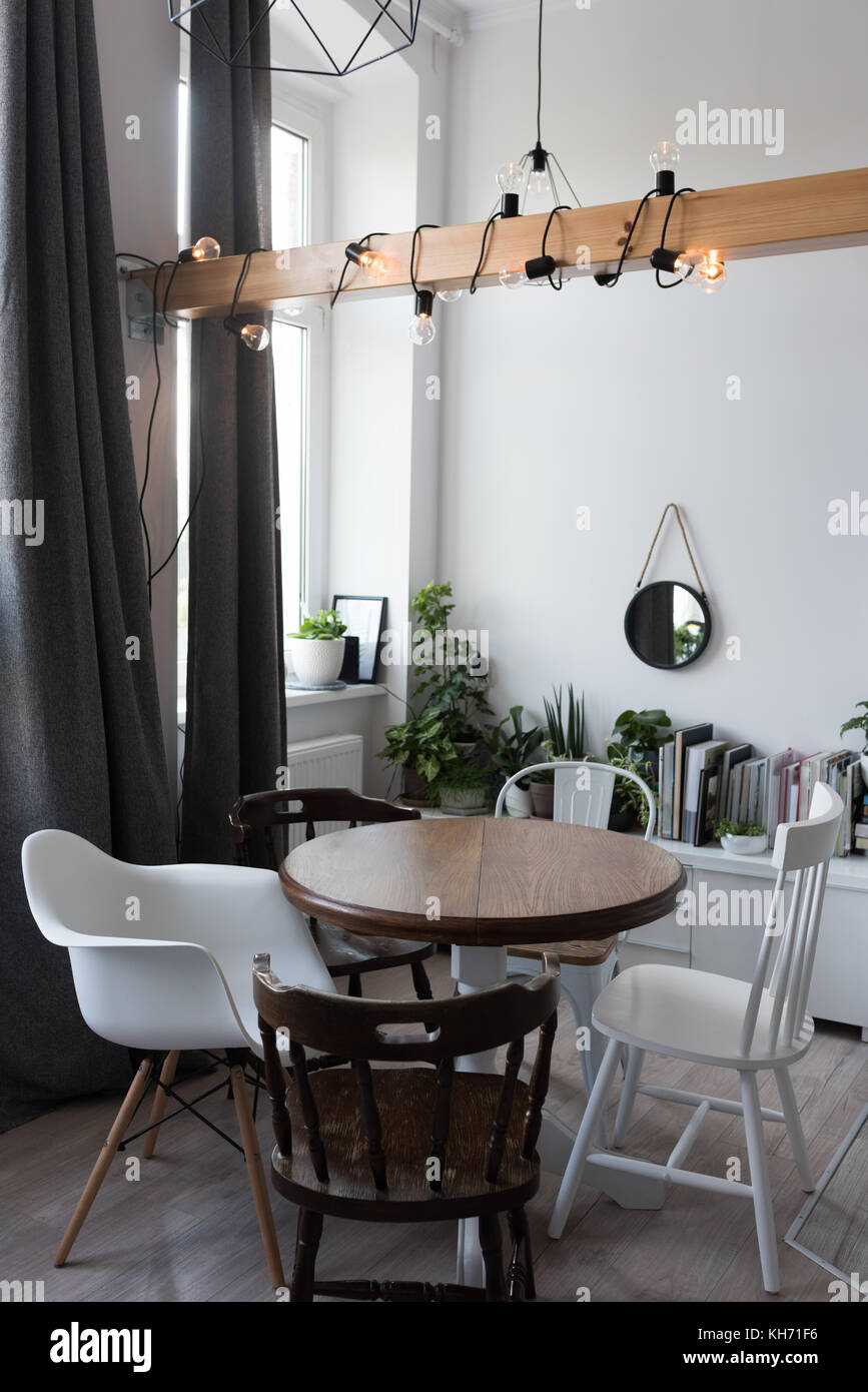 View of a modern dining table at home Stock Photo - Alamy