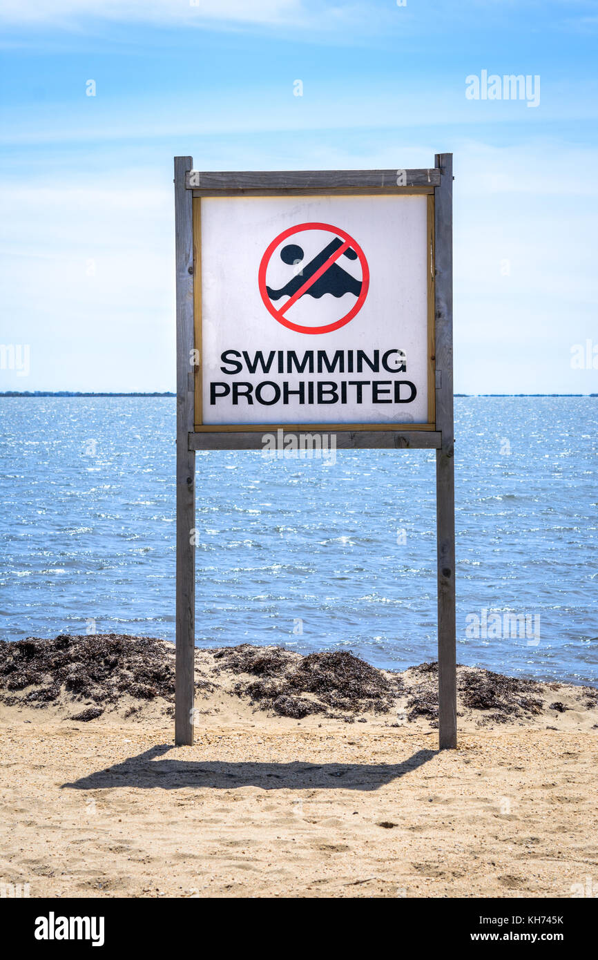 A swimming prohibited sign on a beach Stock Photo - Alamy