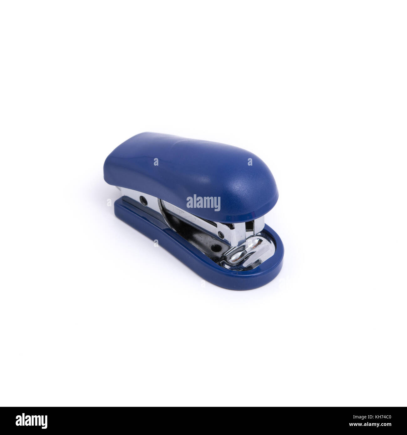 A small blue stapler isolated on a white background Stock Photo - Alamy