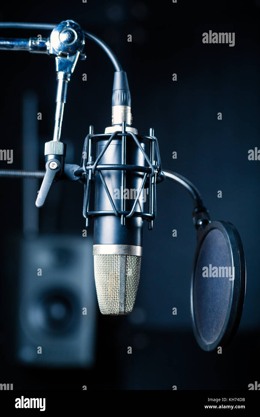 Professional microphone with capacitor or condenser in recording studio ...