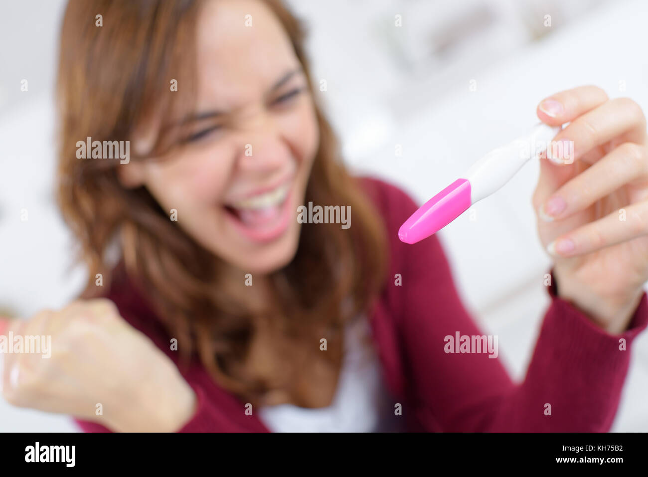 Excited at being pregnant Stock Photo - Alamy