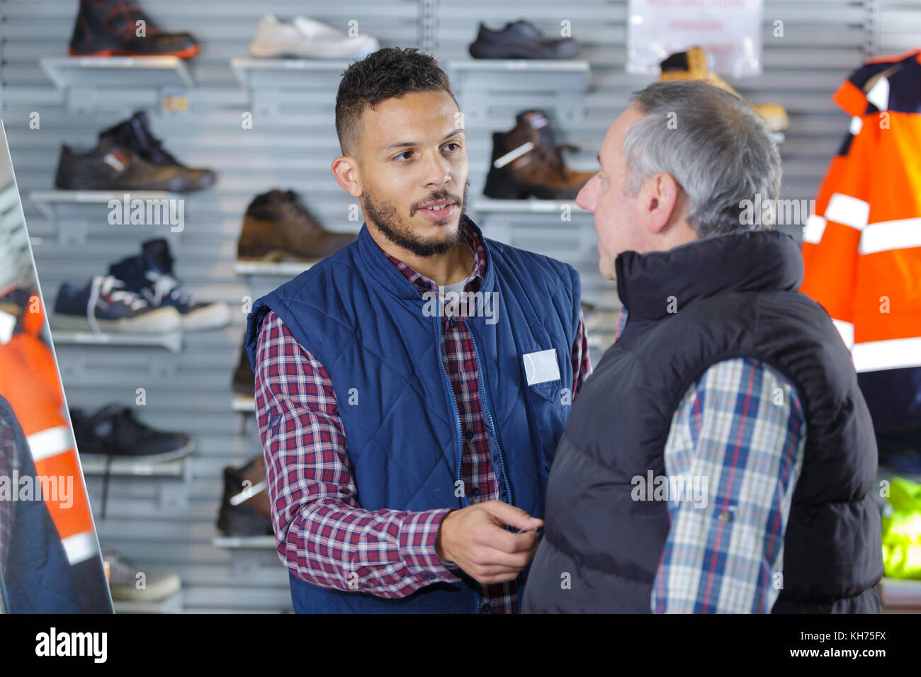 Men in work equipment outlet Stock Photo - Alamy