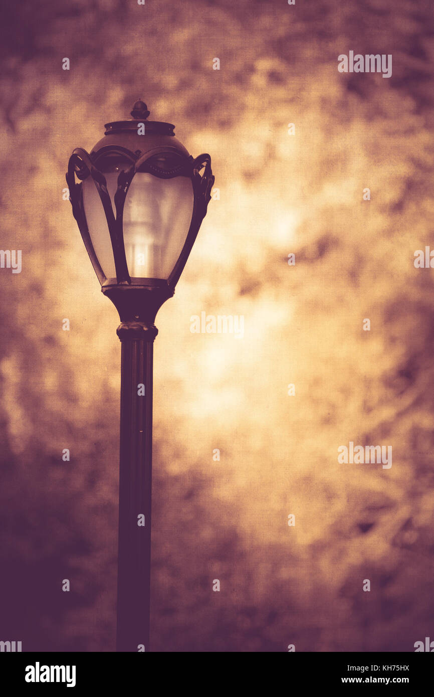 Antique style lamp post with vintage texture Stock Photo - Alamy