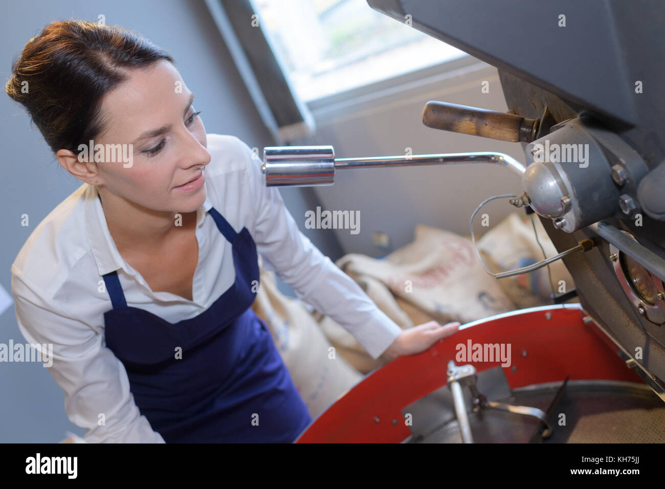 female worker at a coffee factory Stock Photo - Alamy