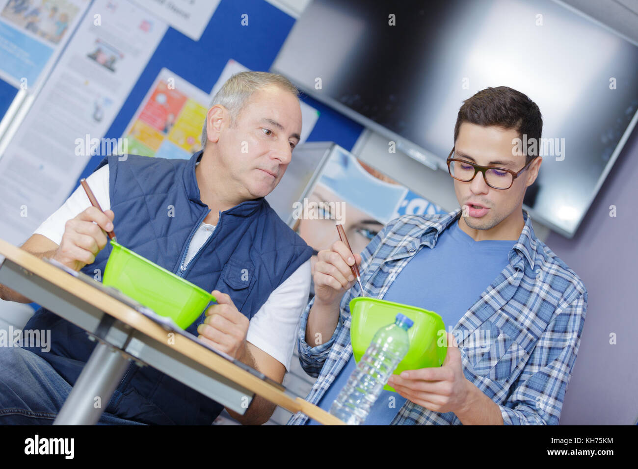 workers having lunch and drinking coffee Stock Photo - Alamy