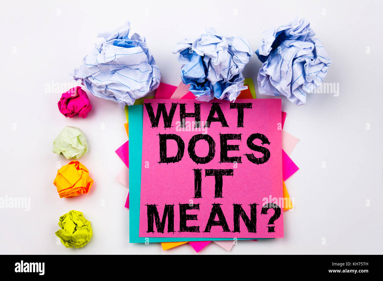 Writing text showing question What Does It Mean written on sticky note ...