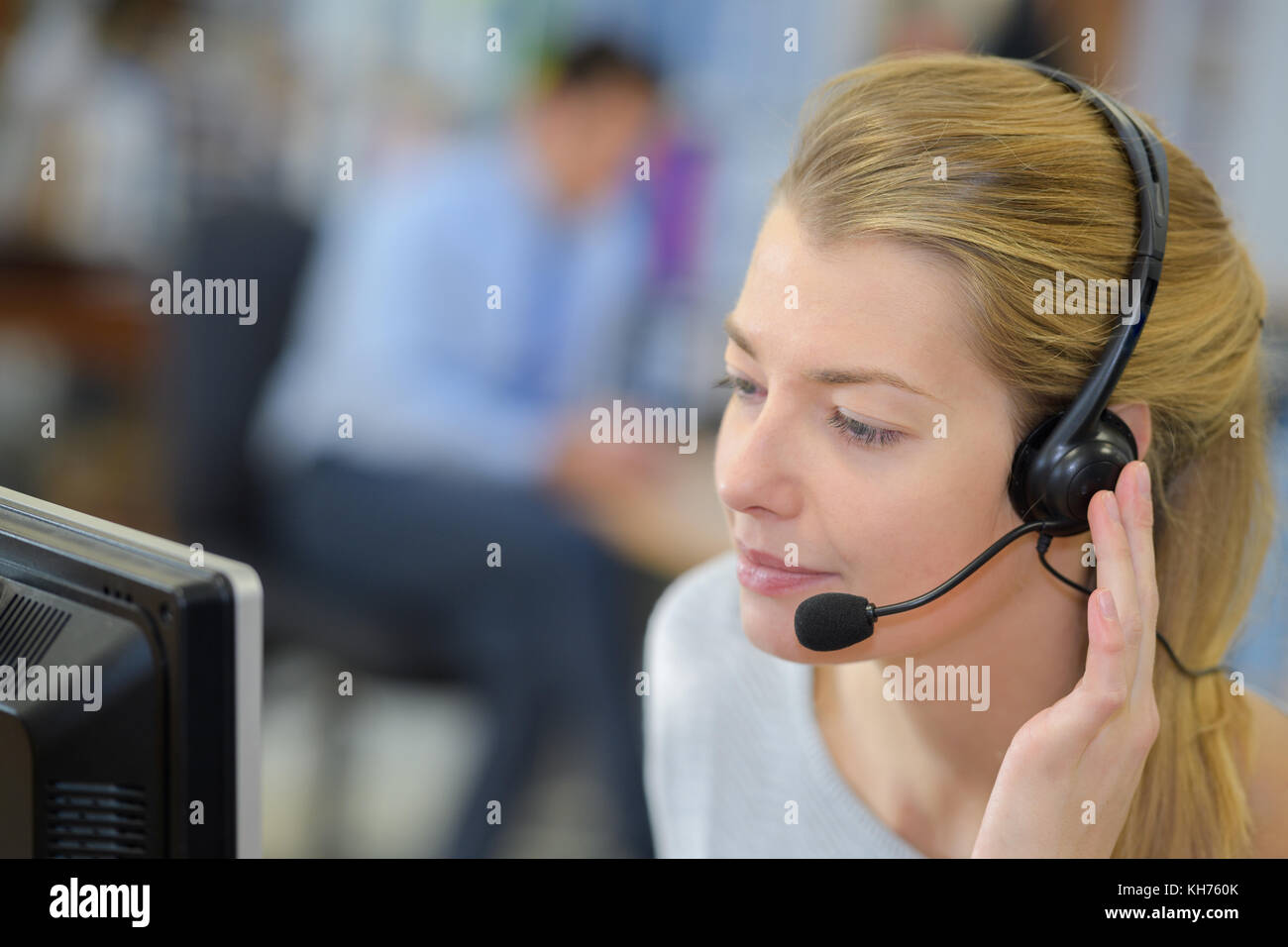 Closeup of woman wearing headset with microphone Stock Photo - Alamy