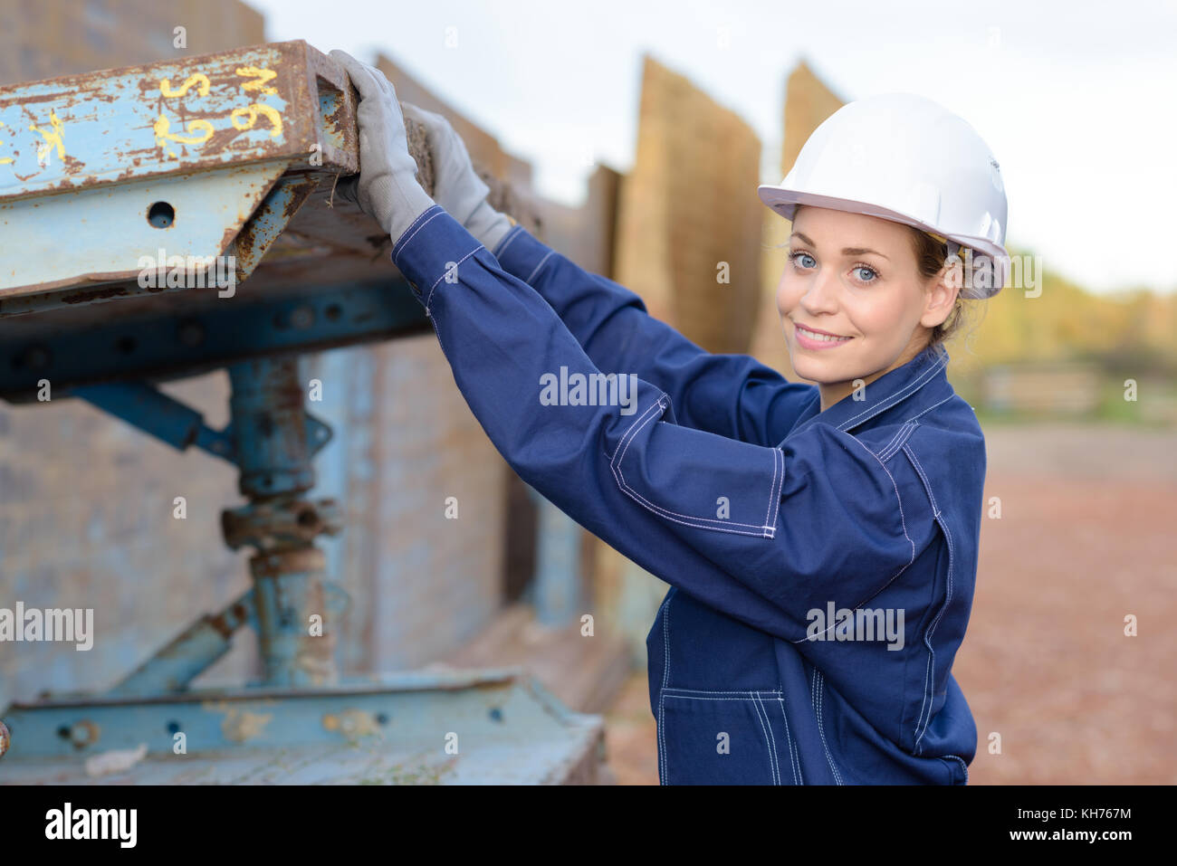 laborer posing and smiling Stock Photo - Alamy