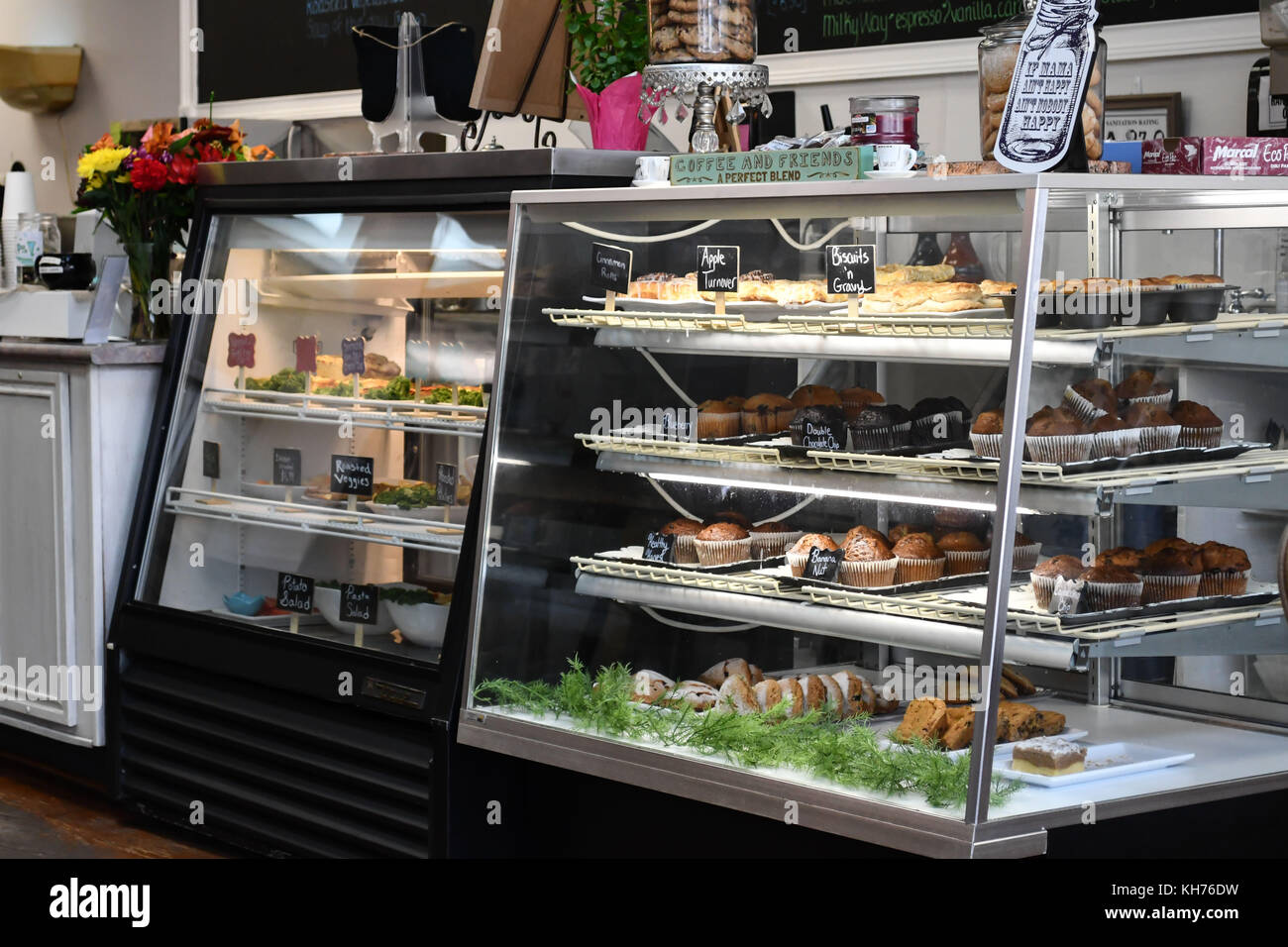 Cafe restaurant interior with colorful food cases filled with sweets ...