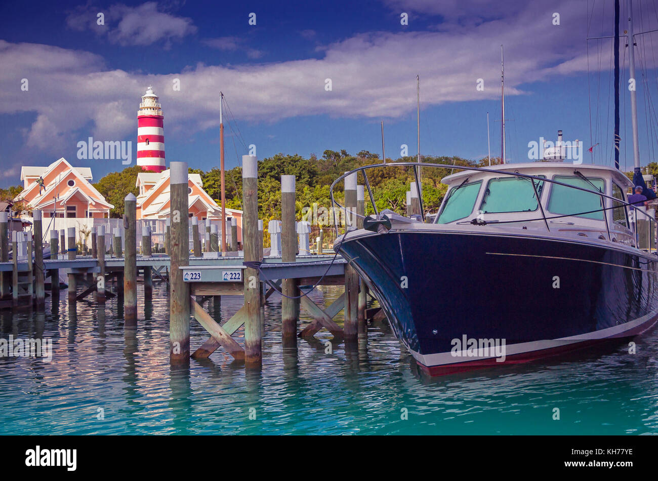 Yacht docked near the Elbow Cay Lighthouse Stock Photo - Alamy