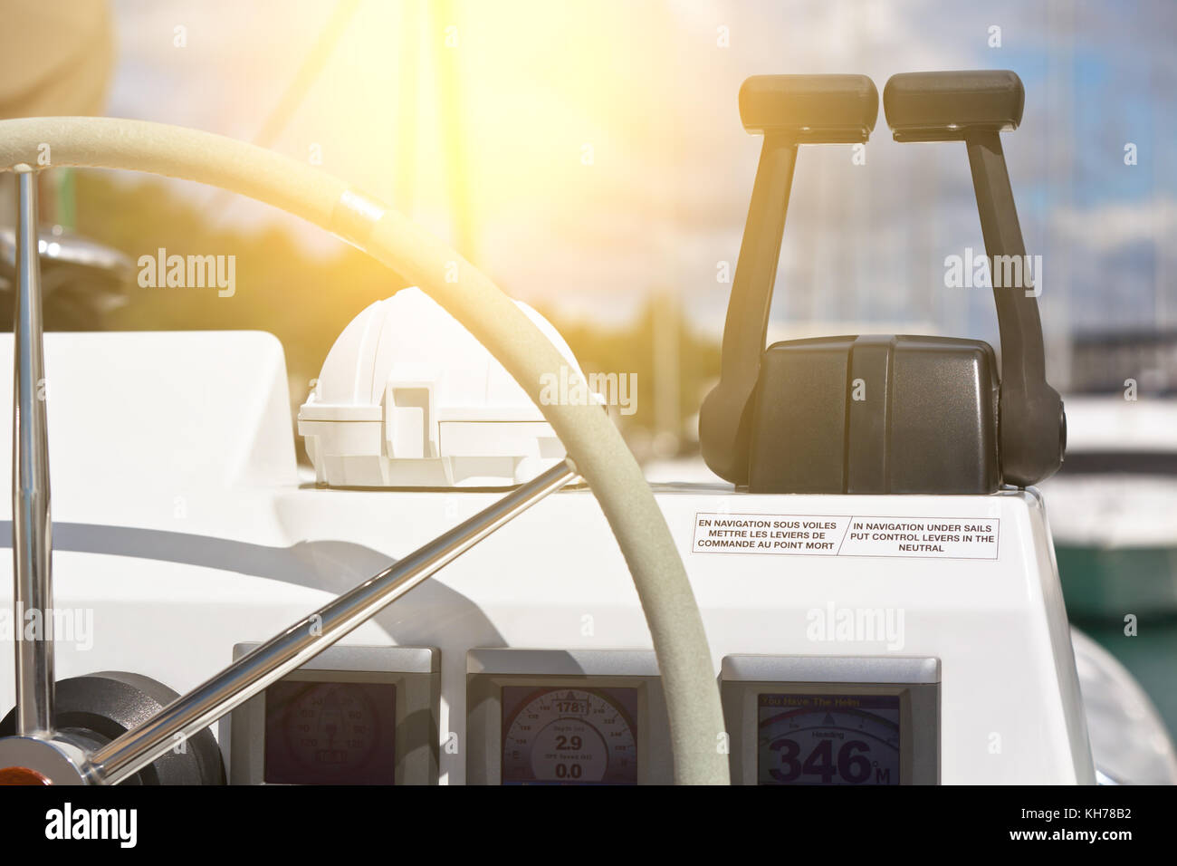 Sailing yacht control wheel and implement. Horizontal shot without ... Sailing yacht control wheel and implement. Horizontal shot without ...