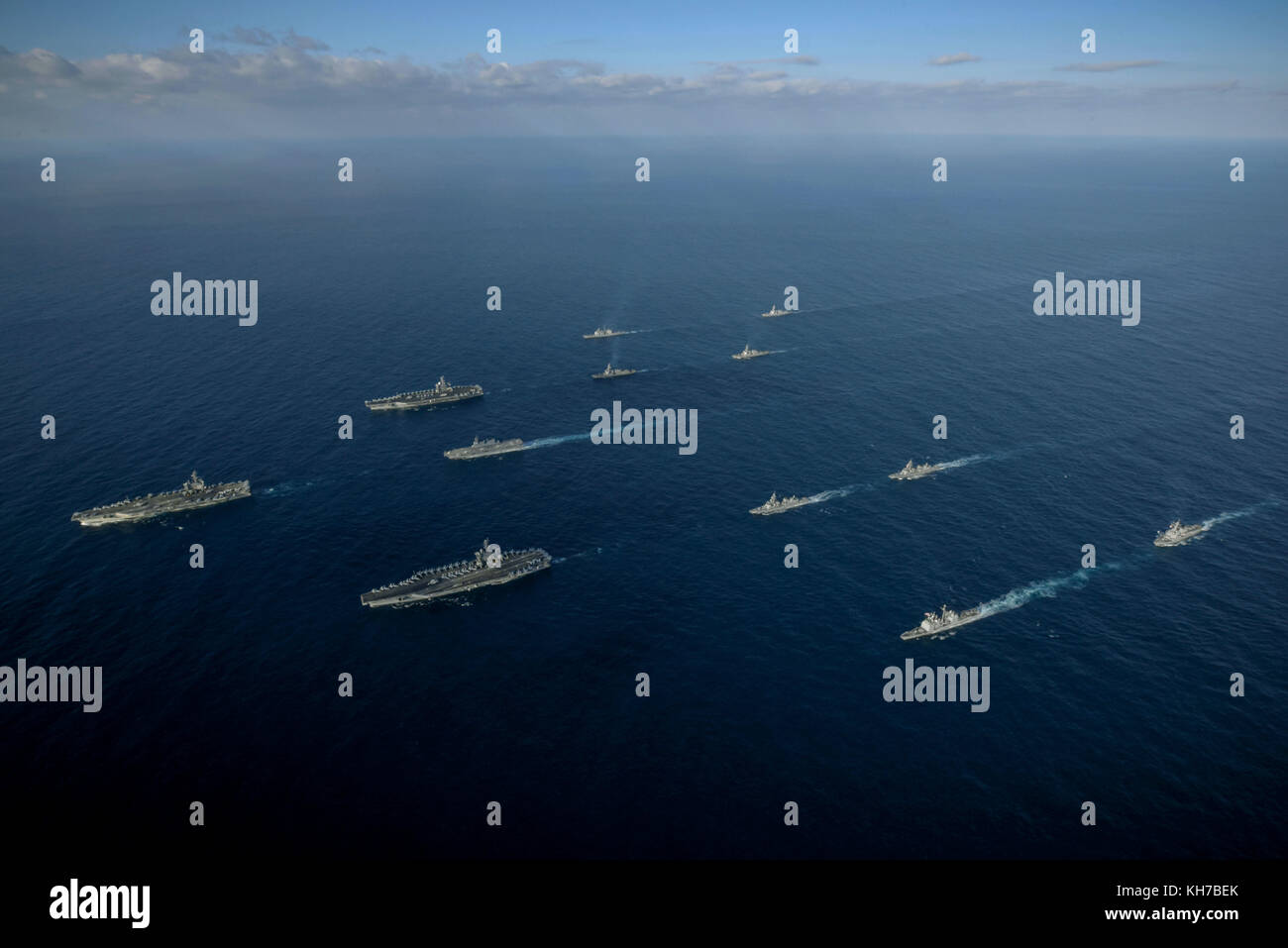 The USS Ronald Reagan (CVN 76), USS Theodore Roosevelt (CVN 71) and USS ...