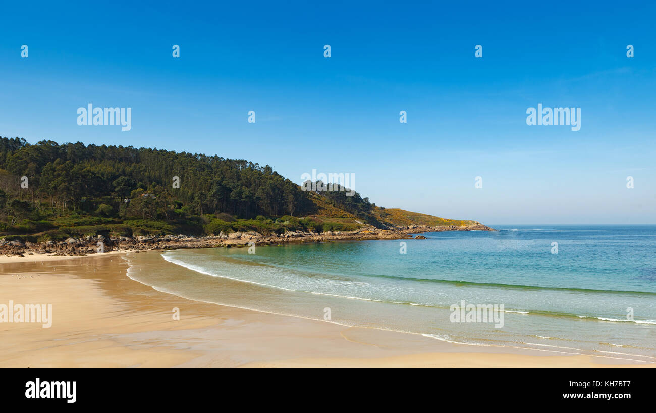 Lonely beach with a amazing blue water Stock Photo - Alamy