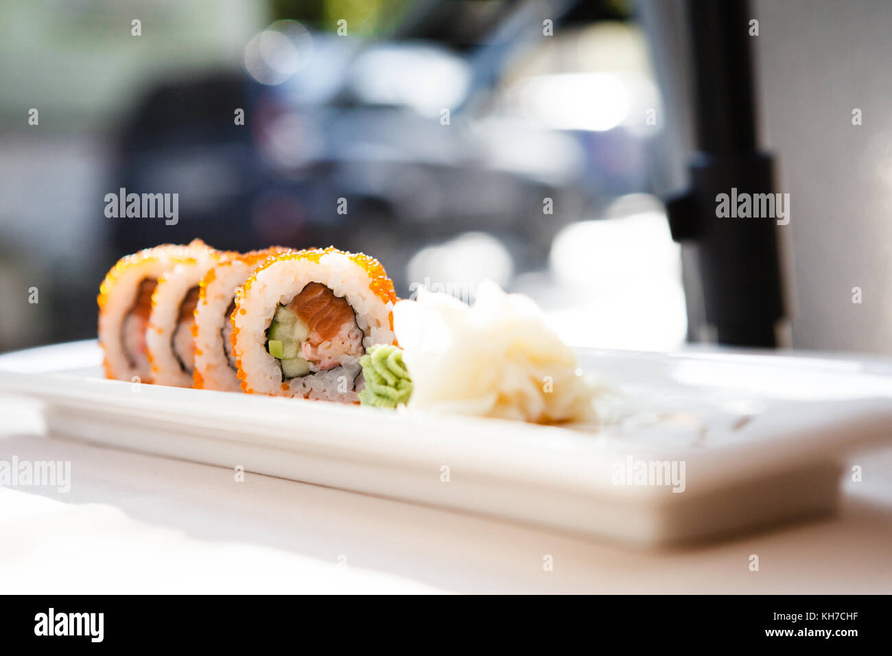 Flying fish roe maki with wasabi and ginger Stock Photo - Alamy