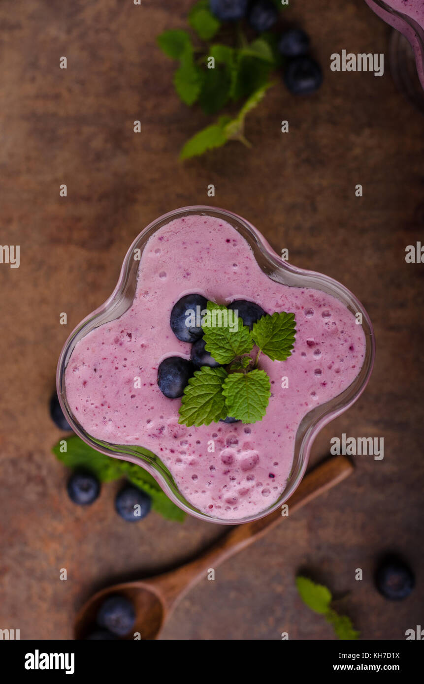 Berries milkshake smoothie, delish with fresh herbs mint Stock Photo ...