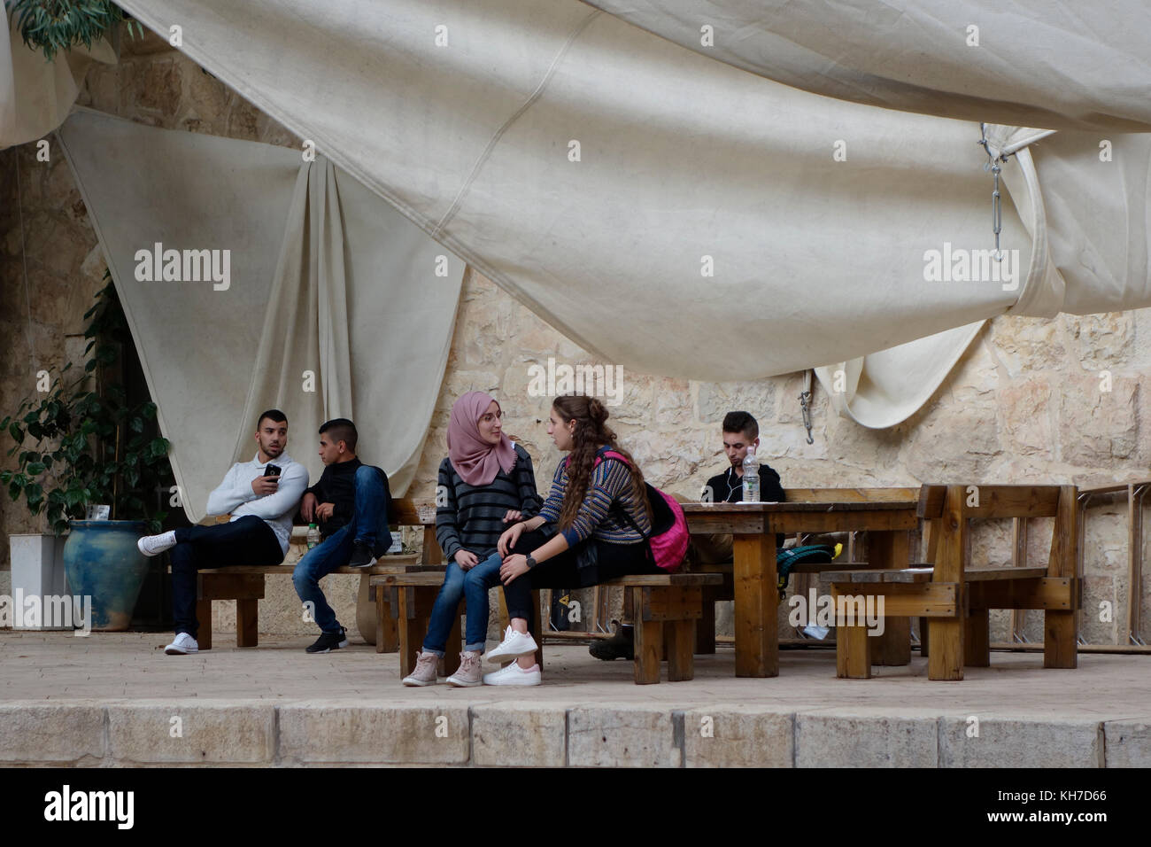 Arab-Israeli female students students sitting at the courtyard of the ...