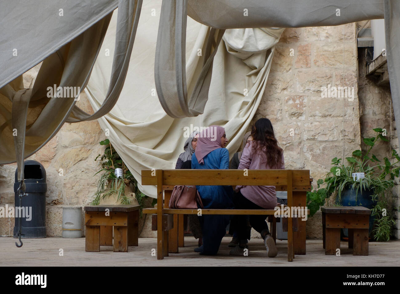 Arab-Israeli female students students sitting at the courtyard of the ...