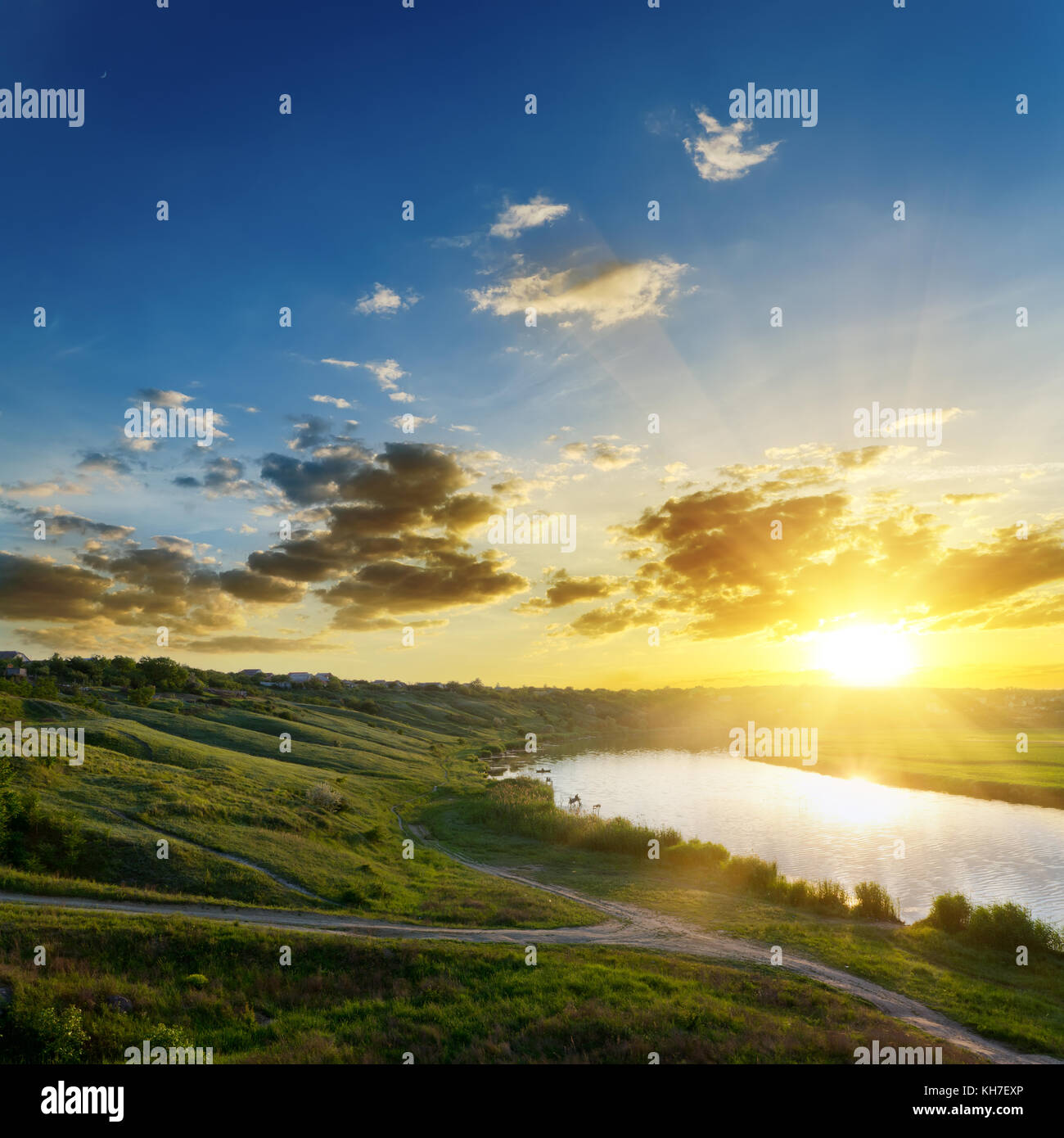 dramatic sunset over river Stock Photo - Alamy