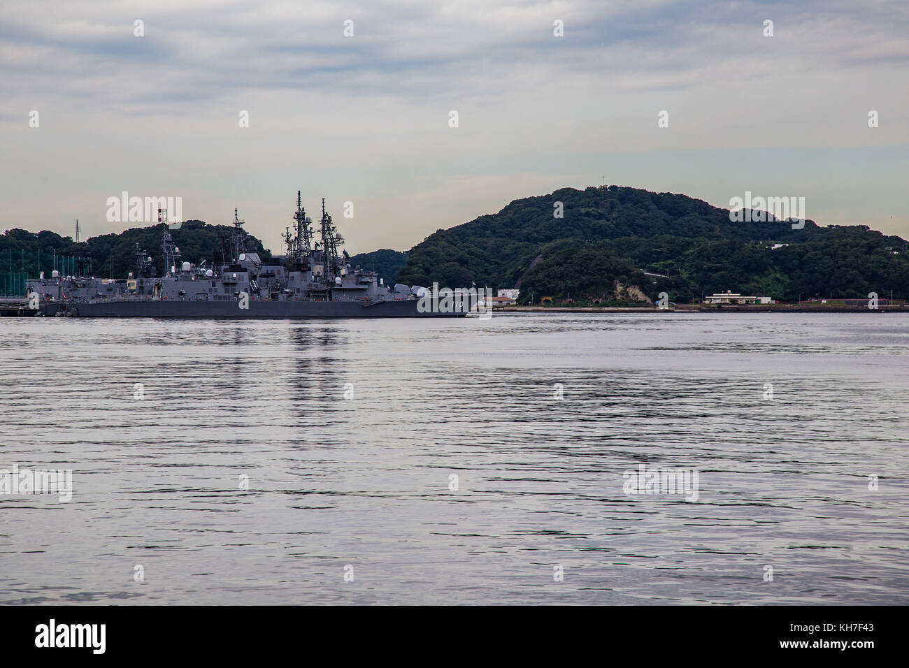 Ships of the JMSDF sit in port, moored in Yokosuka Harbor. The U.S ...