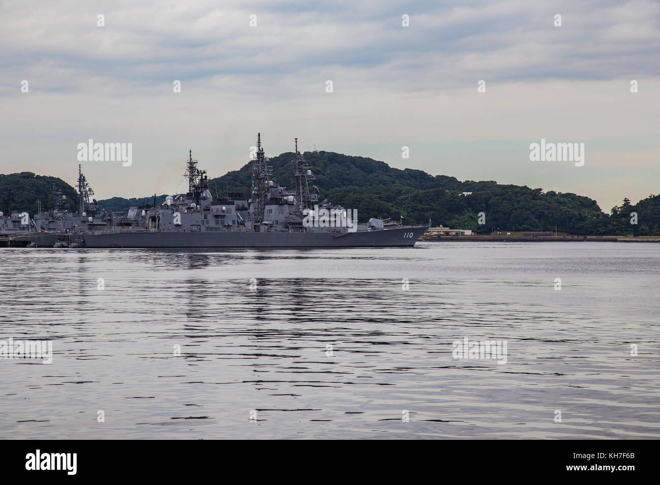Ships of the JMSDF sit in port, moored in Yokosuka Harbor. The U.S ...