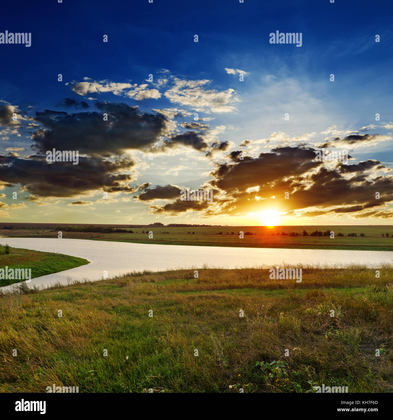dramatic sunset over river Stock Photo - Alamy