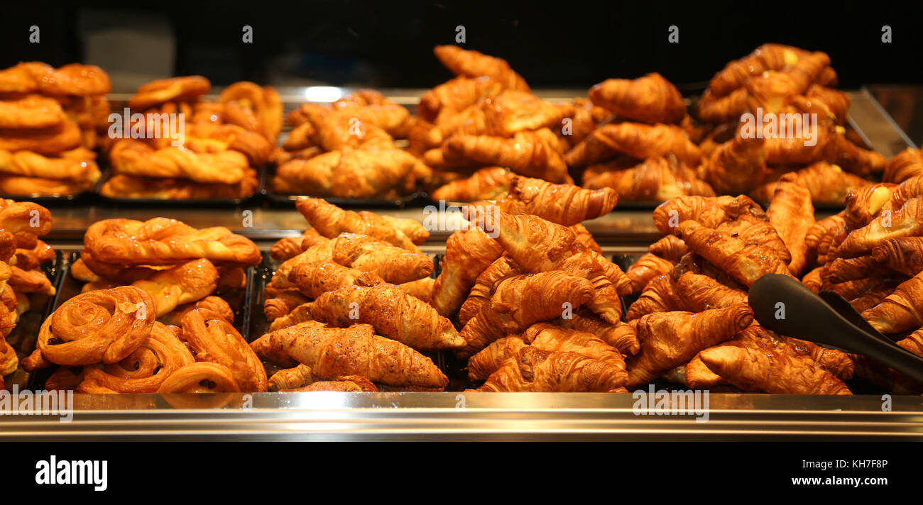 many fragrant brioches and pastries in the bar with a big mirror Stock ...