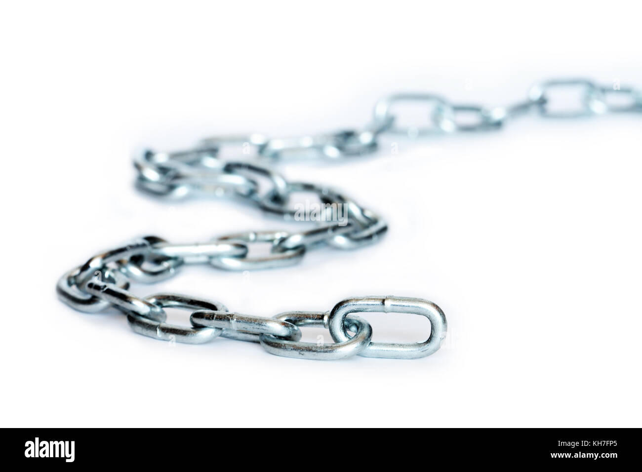 Closeup of long metal chain on white background Stock Photo - Alamy