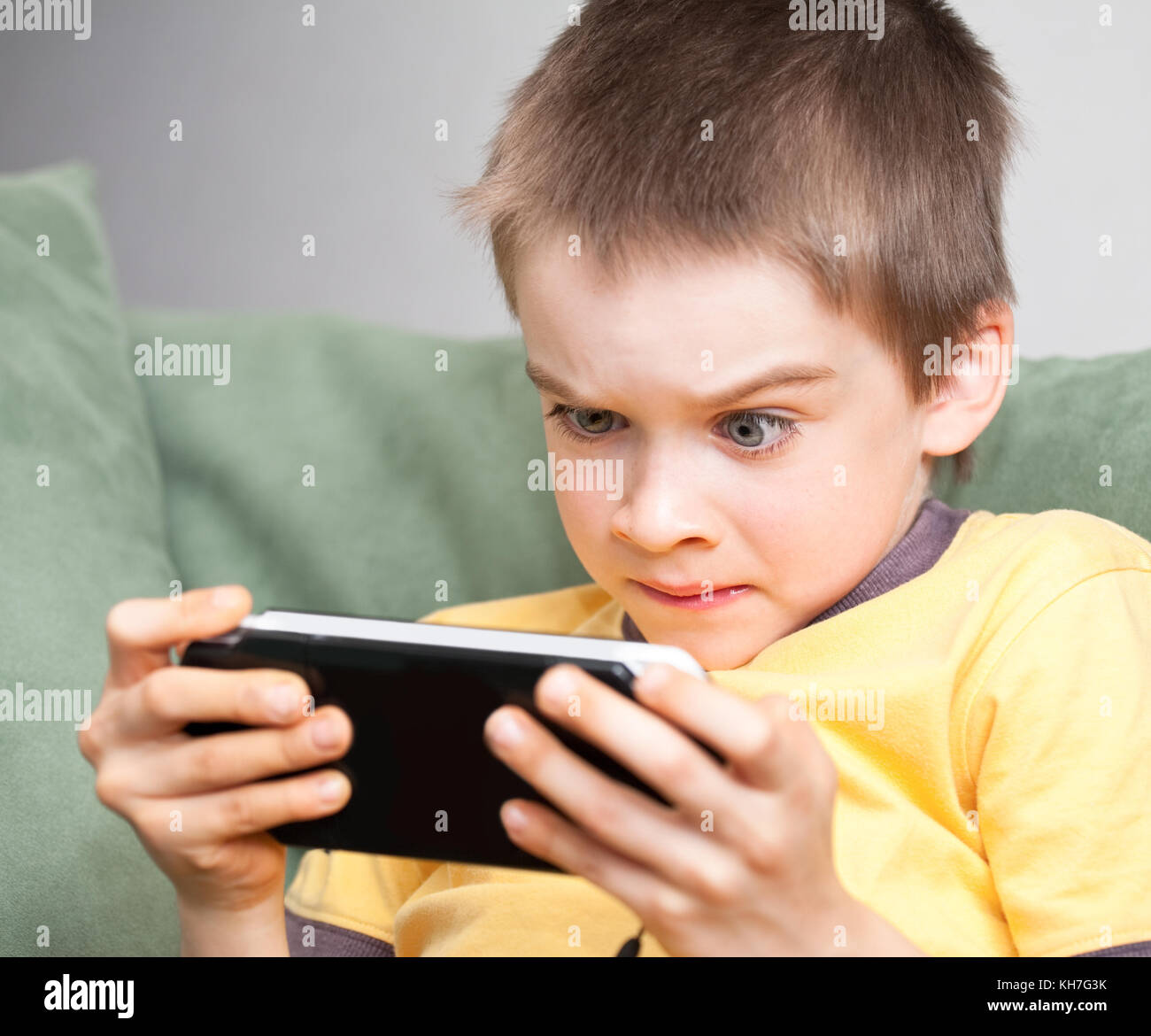 Handheld computer console hi-res stock photography and images - Alamy