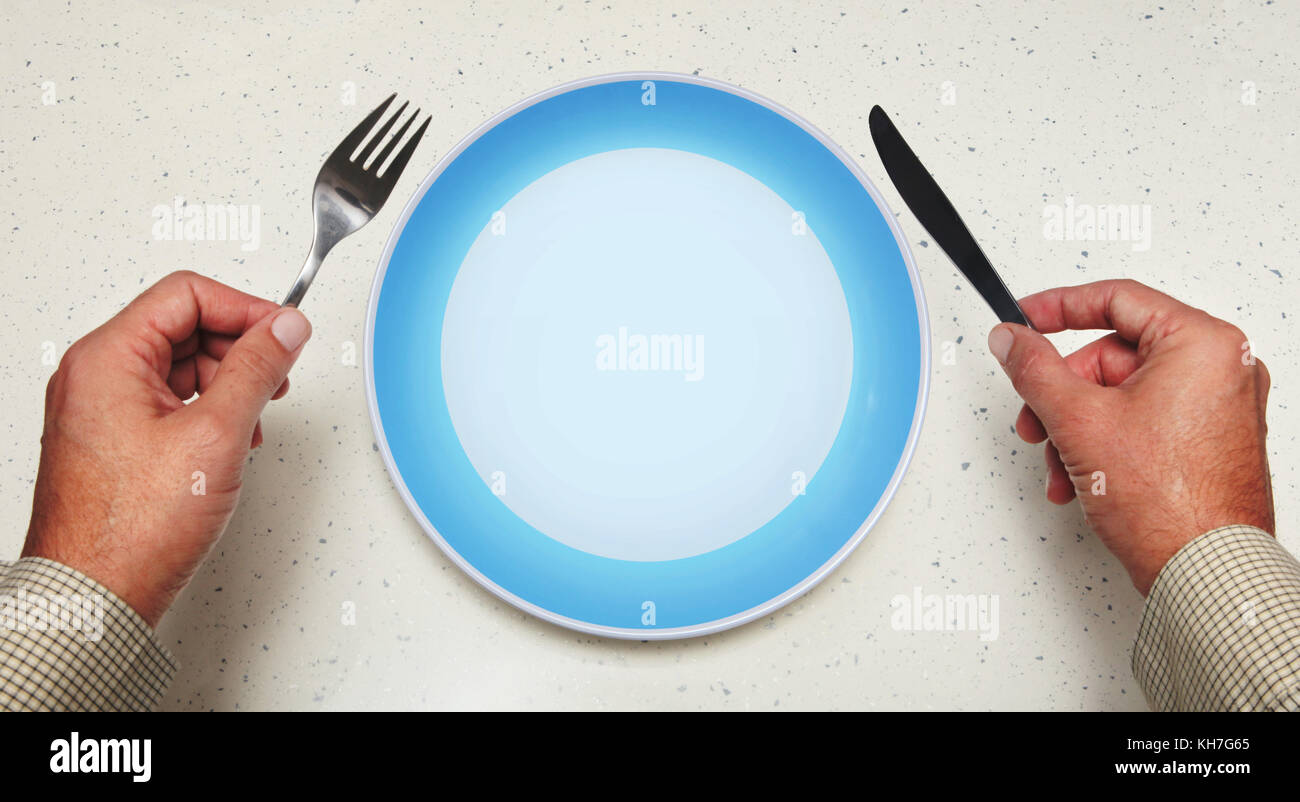Hungry man empty plate hi-res stock photography and images - Alamy