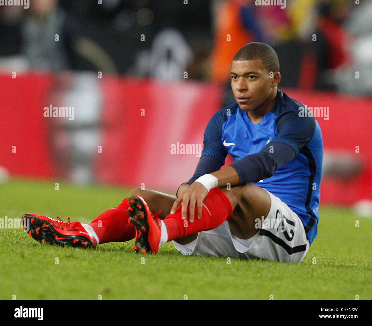 Cologne, Germany. 14th Nov, 2017. France's Kylian Mbappe sitting on the ...