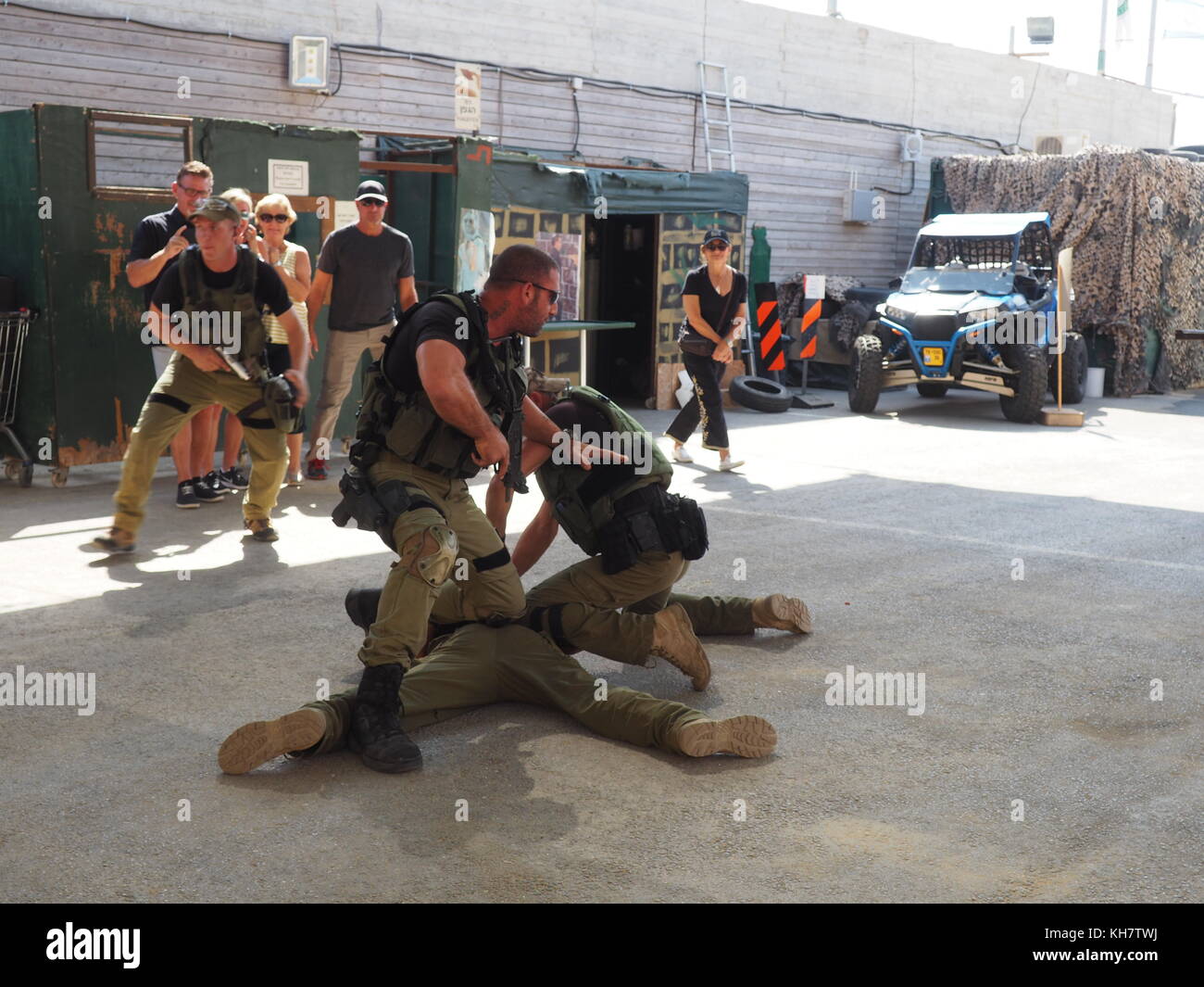 The head of the combat trainers, Eitan Cohen (front L), overwhelms an ...