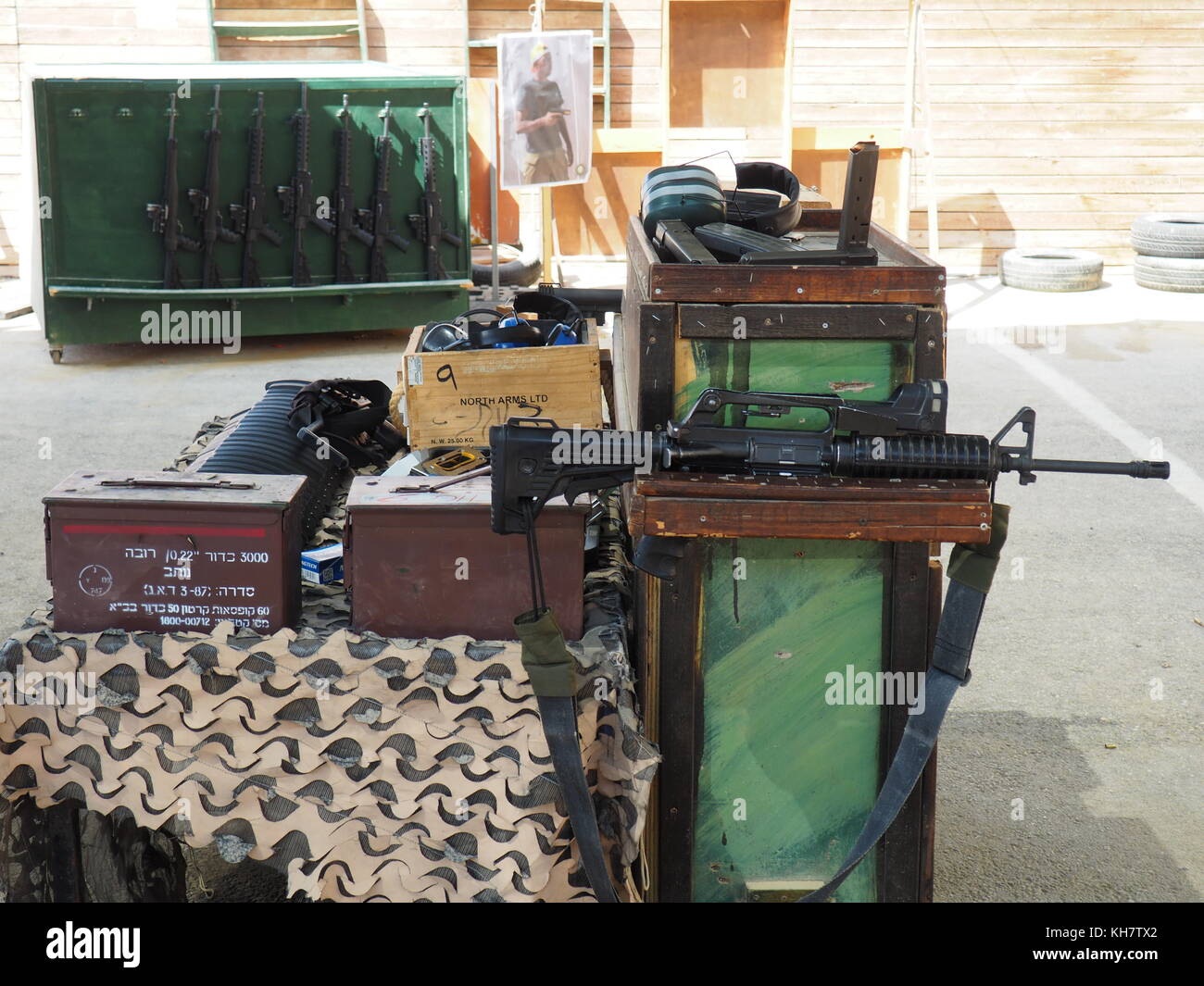 Automatic weapons lie at the Israeli shooting range 'Caliber 3' in the ...