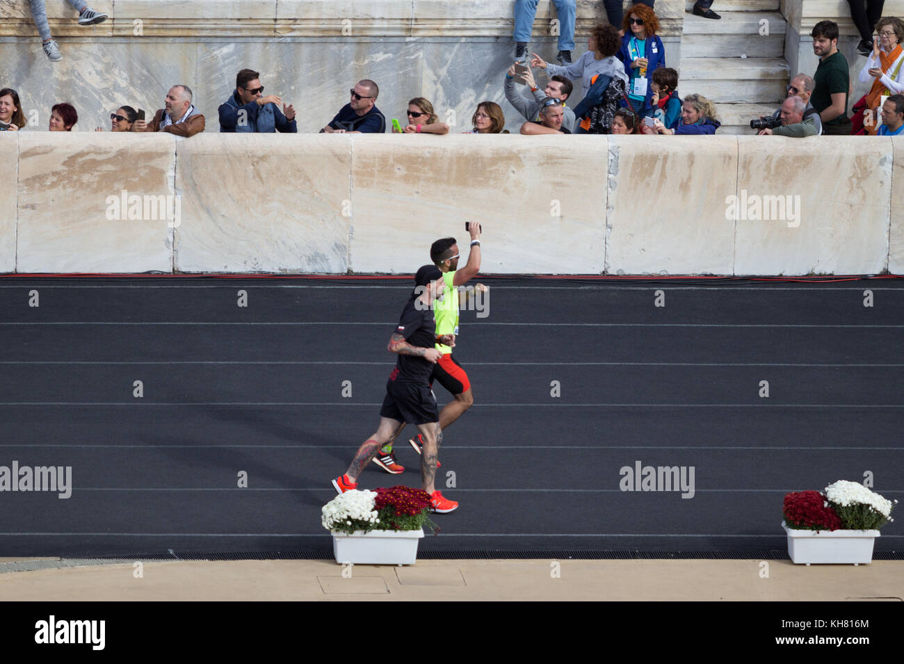 Male athlete reaching finish line hi-res stock photography and images ...