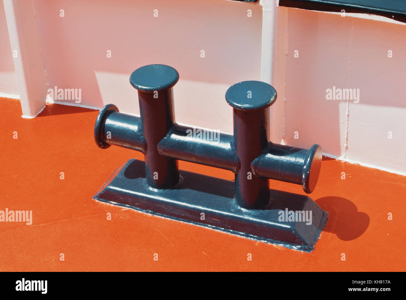Ship details, black metal mooring bollard at the deck of a ship on ...