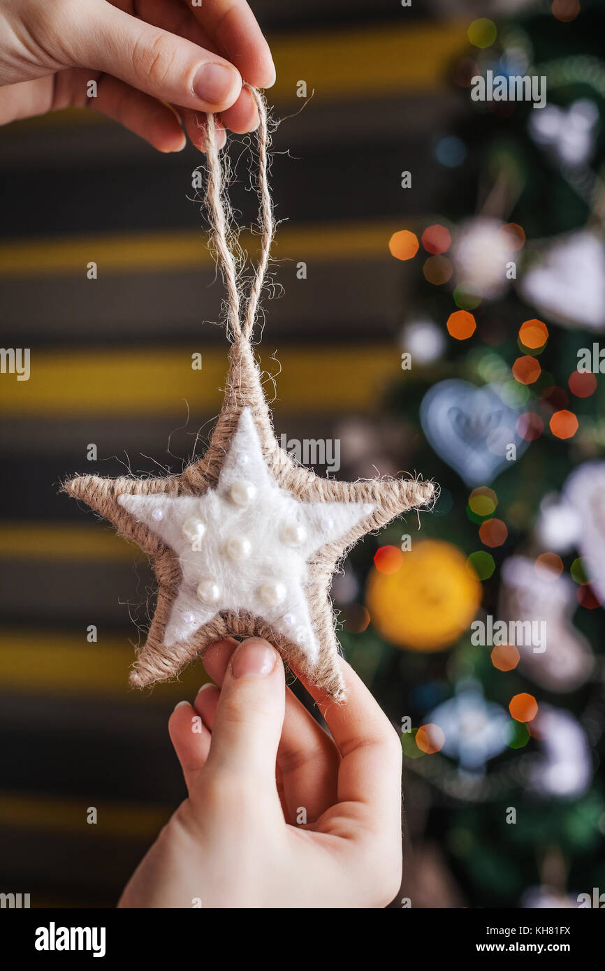 Christmas handmade twine star Stock Photo - Alamy
