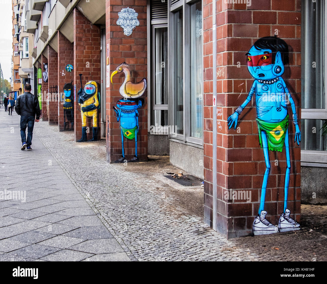 Berlin-Schöneberg.Colourful cartoon alien figures by street artist ...