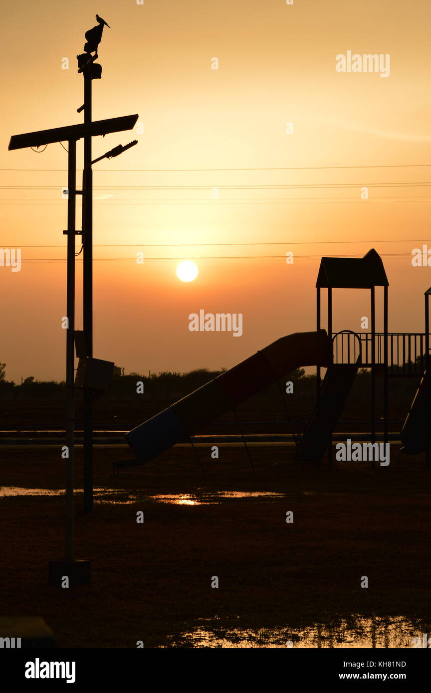 objects against rising sun Stock Photo - Alamy