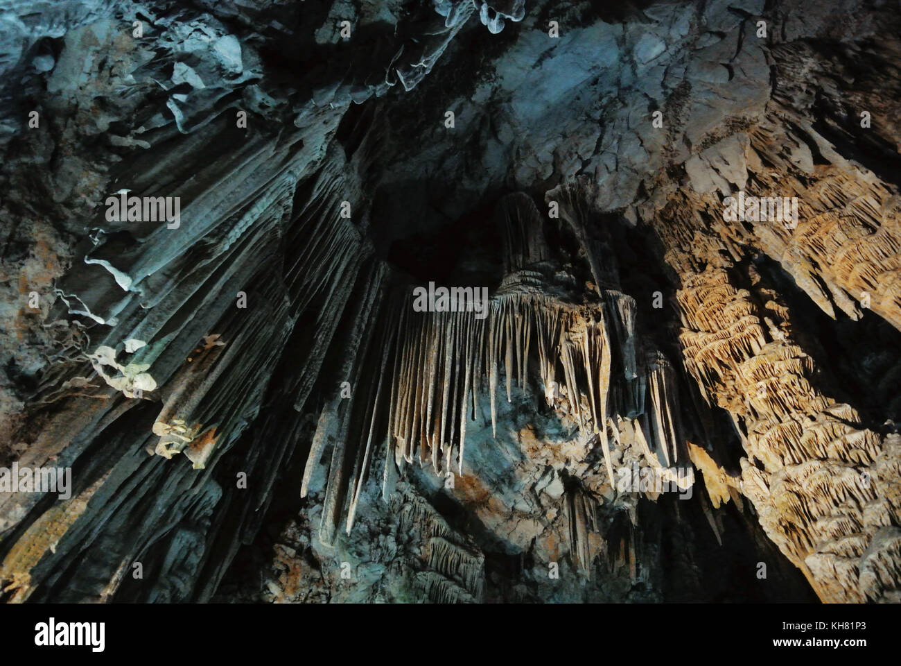 Beautiful illuminated cave formations and stalactites inside of the St ...