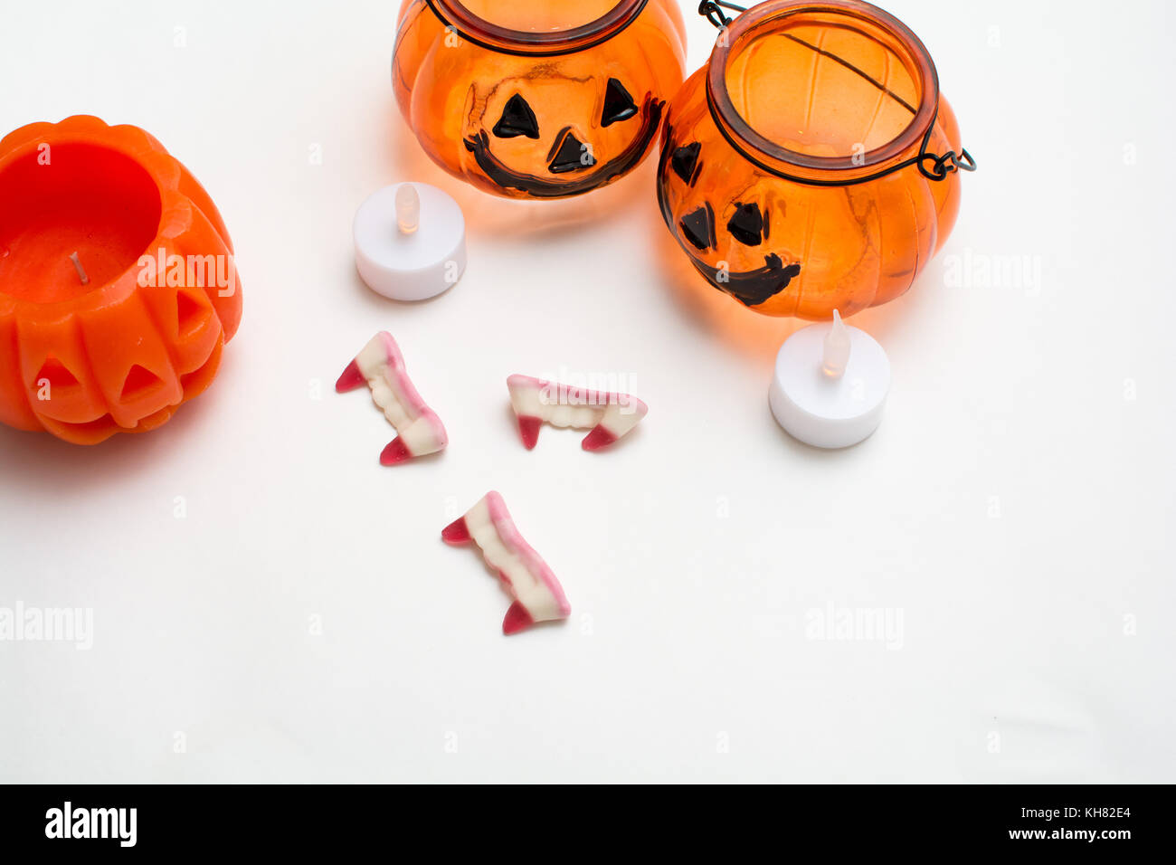 Halloween party objects arranged and isolated on a white background ...